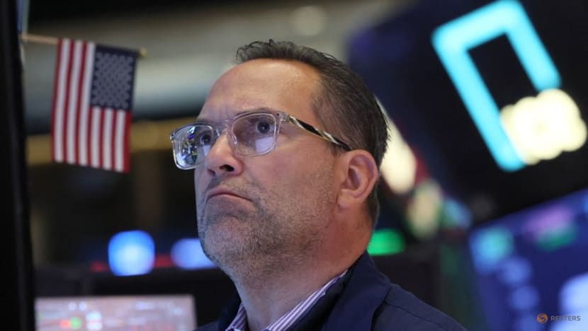 Stocks, commodities slip as soft US data signals cooling economy - CNA