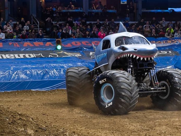 Watch massive trucks perform death-defying airborne stunts at Monster ...