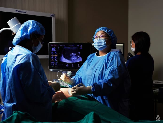 Dr June Tan, foetal surgeon at KKH, helps pregnant parents with hard ...