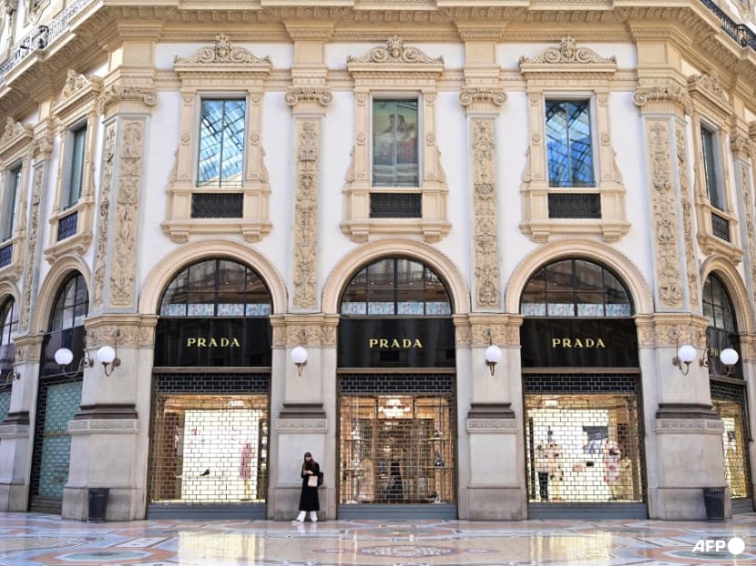 Prada is not looking to snap up competitors such as Armani or Versace ...