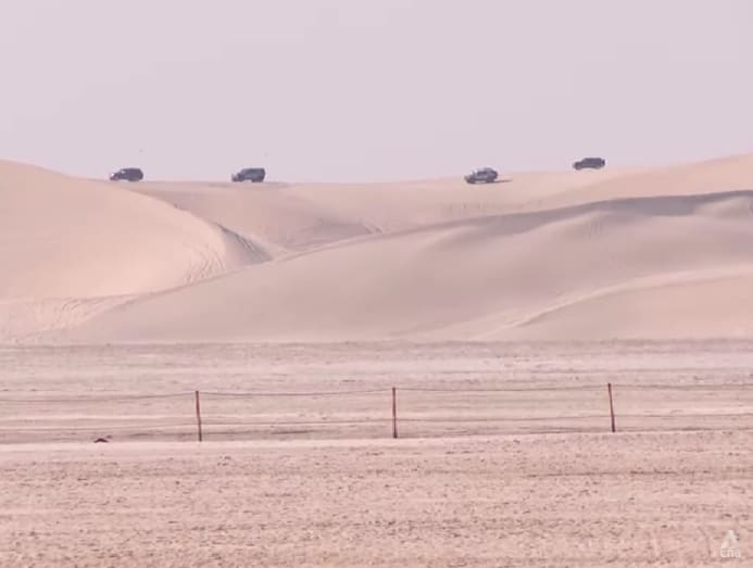 Singaporeans in Qatar bond over dune bashing in the desert during ...