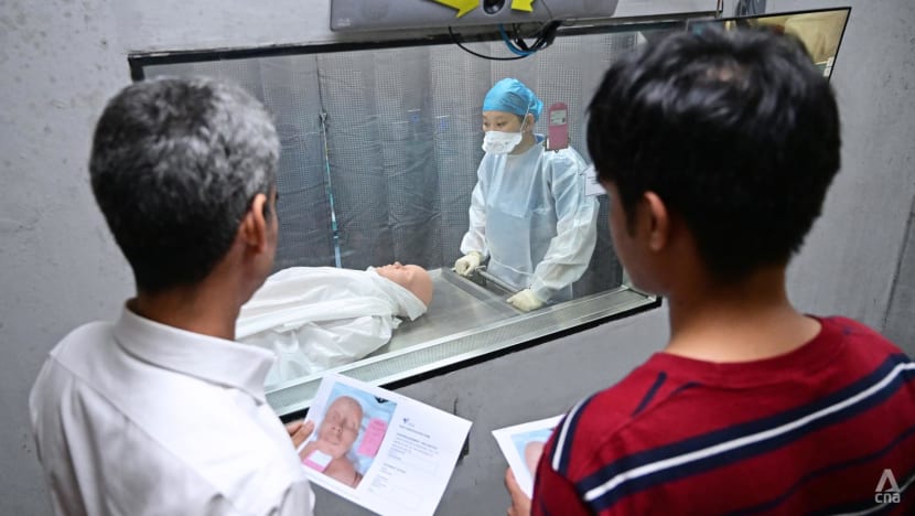 He handles death daily, but Singapore’s top coroner takes pride in ...