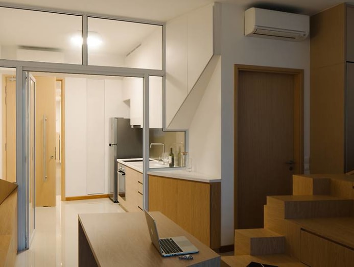 A 460 sq ft studio apartment with a literal out-of-the-box space-saving ...