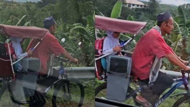 用改装脚踏车载女上学 马国慈父暖举感动网民 - 8world