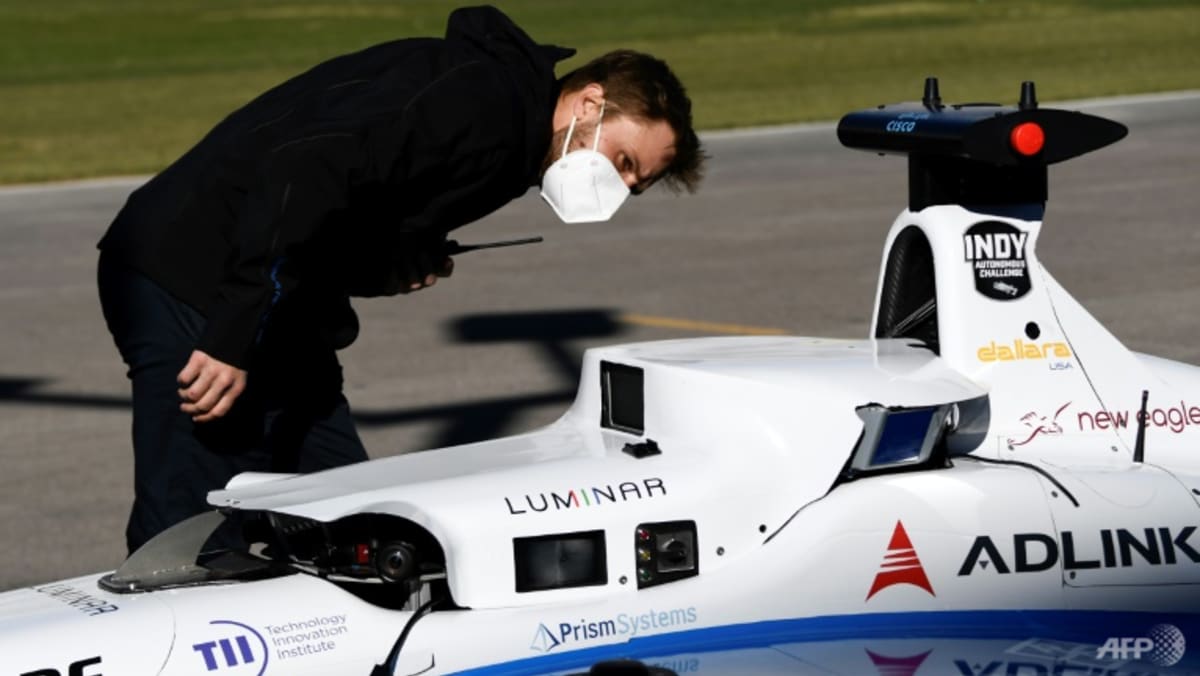 Self-driving race cars zip into history at CES - CNA