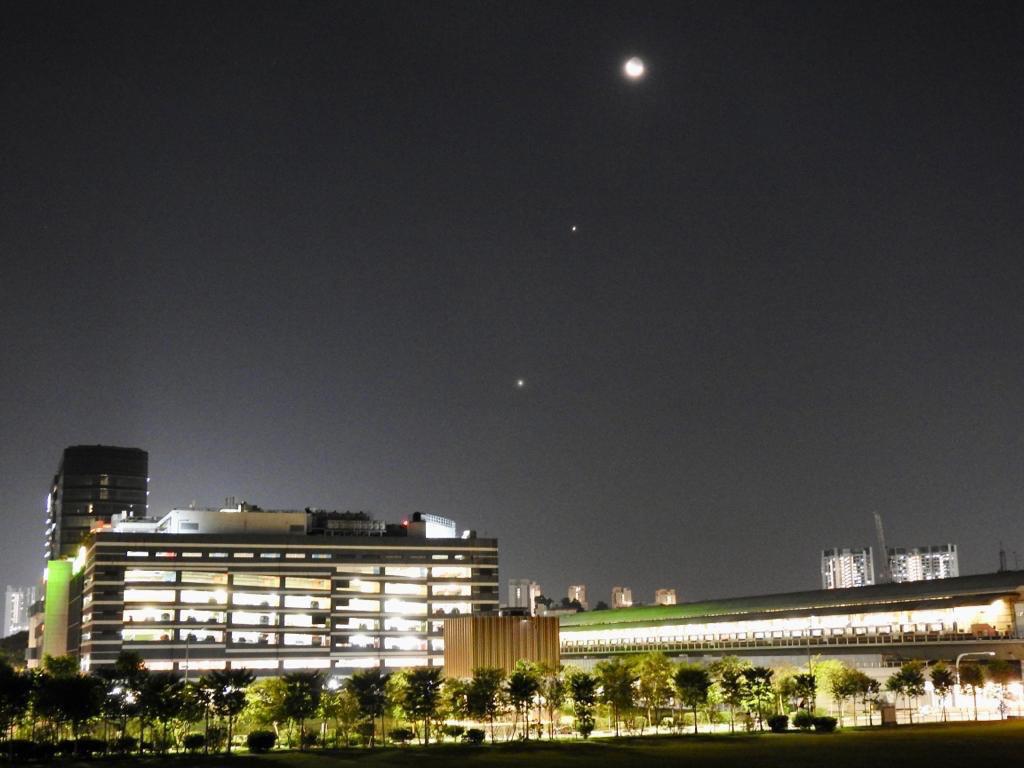 In pictures: Crescent moon, Jupiter and Venus seen in alignment over ...