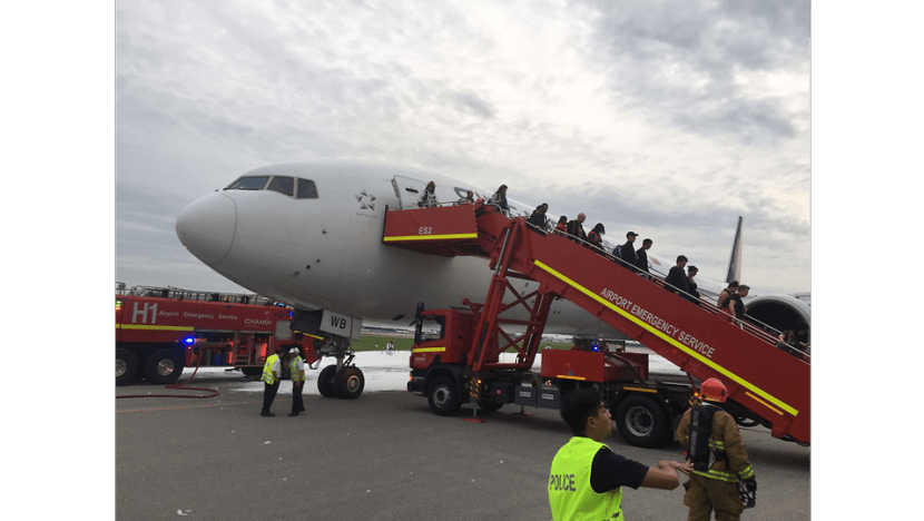 SIA flight catches fire while making emergency landing in Singapore - CNA