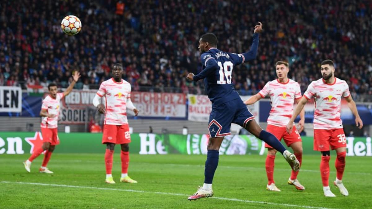 Wijnaldum scores first PSG goals in 2-2 draw at Leipzig - CNA