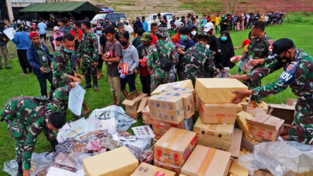 Aid effort intensifies after Indonesia quake that killed 81 - CNA