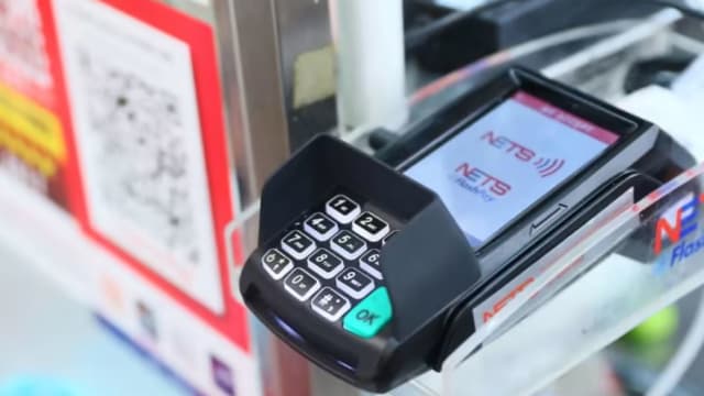 NETS部分终端机服务中断 一些顾客无法使用QR码付款 - 8world