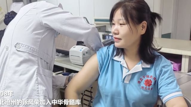 15年不换手机号码 中国女子因此救人一命 - 8world