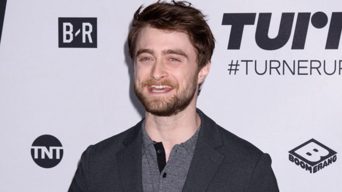 Daniel Radcliffe Trades His Wand For Angel Wings, Flexing His Comedic ...