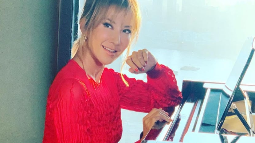 Chinese-American singer Coco Lee dies aged 48 - CNA