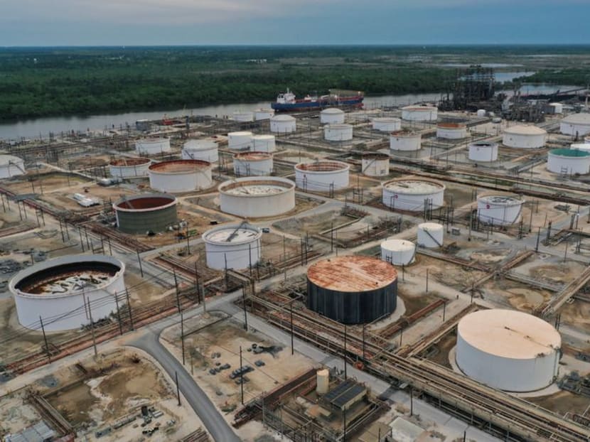 Oil prices jump but post third straight weekly fall on economic woes ...