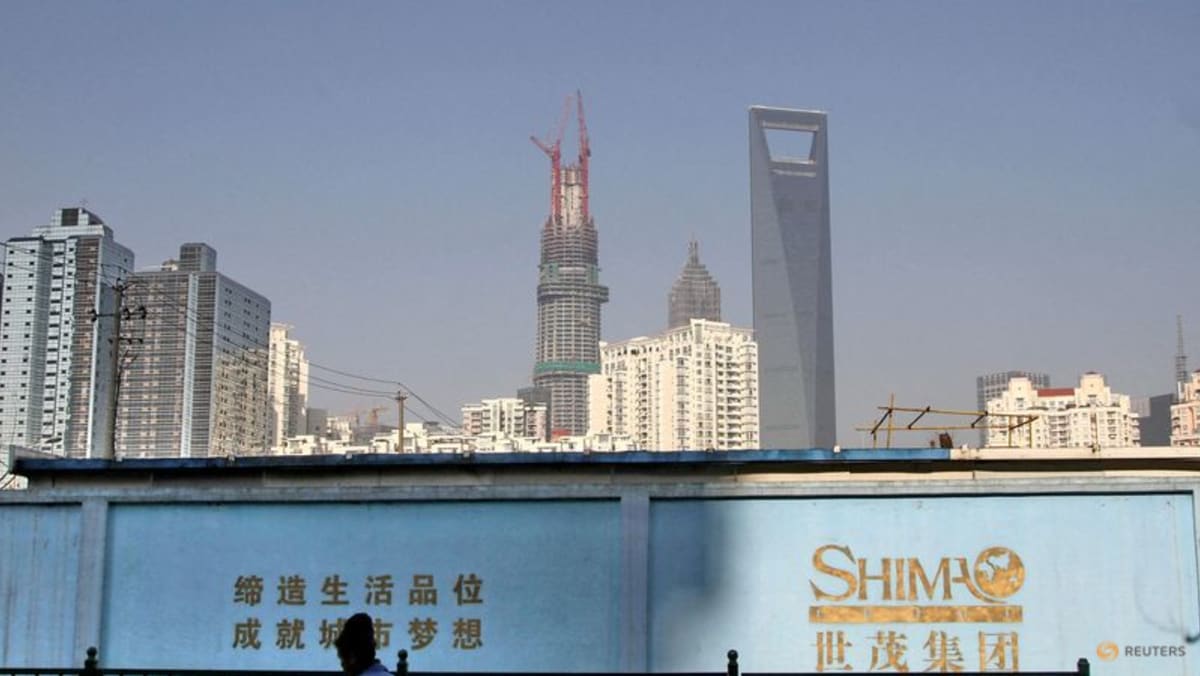 Chinese developer Shimao sells unit in a bid to reduce debt - CNA