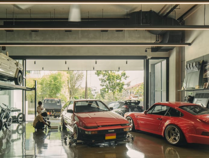 A car enthusiast’s dream house with a garage space that can fit up to ...