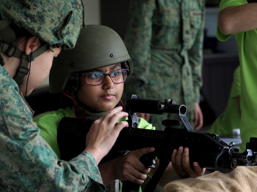 Fall in! 103 women take on standard obstacle course, handle rifles at ...