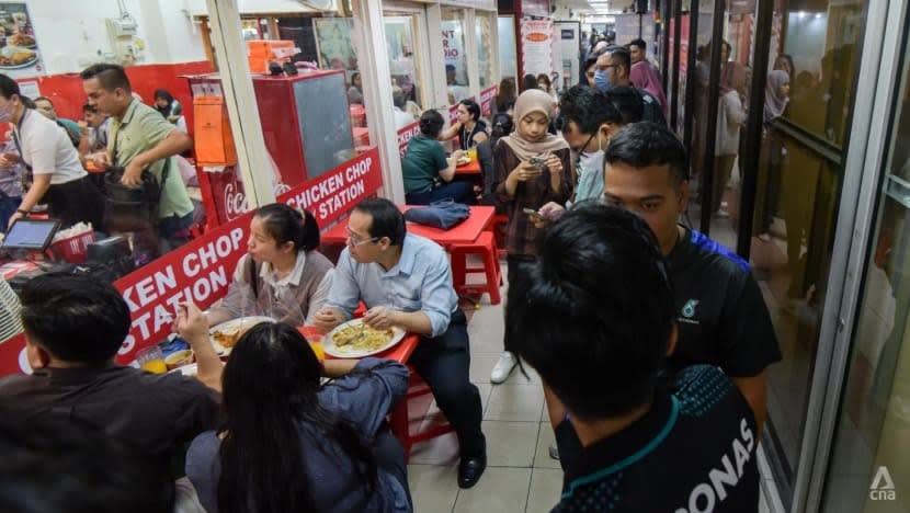 Dasar gaji progresif Malaysia: Mengapa pekerja dan majikan ragu-ragu manfaatnya - CNA