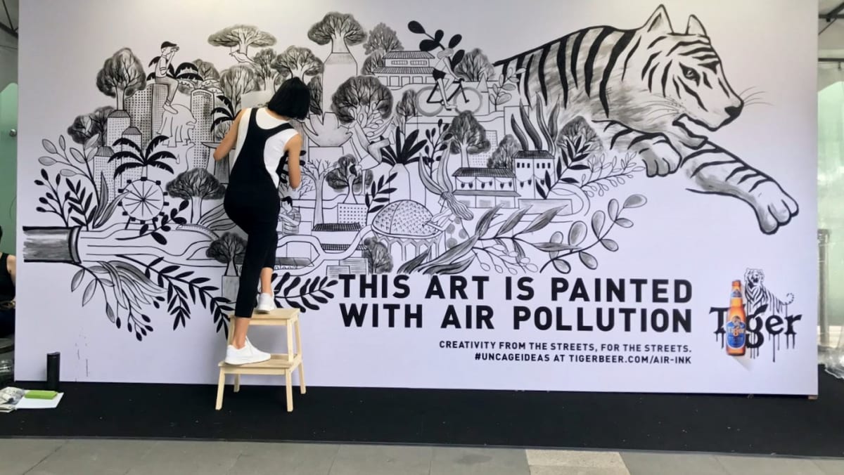 Artists in action with ‘air pollution pen’ - TODAY