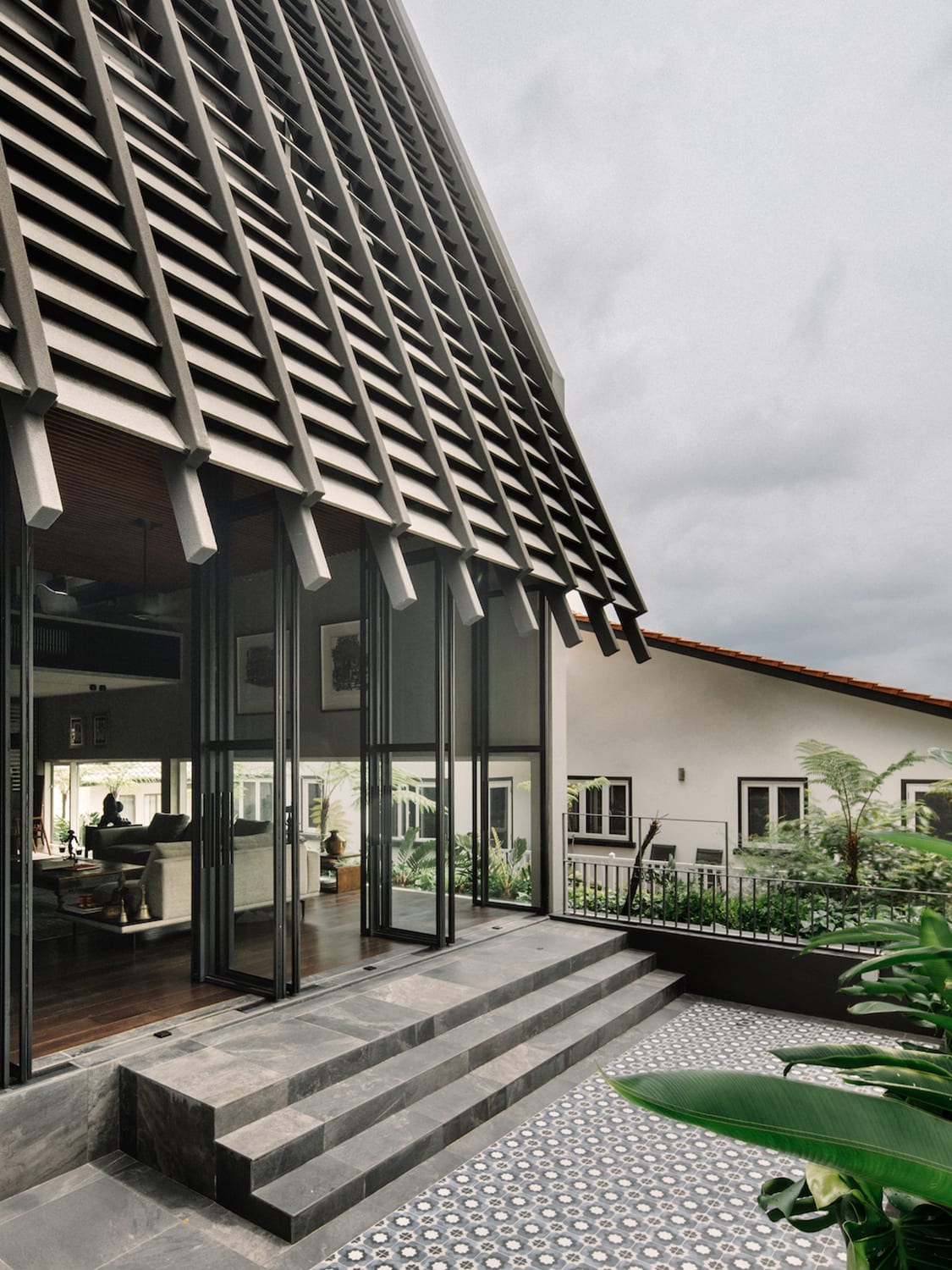 Singapore home tour: A 4-storey house with an unusual, slanted roof and ...