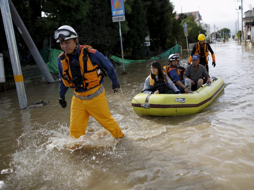 Rescuers search for missing after Japanese city flooded - TODAY