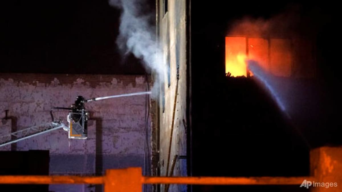 Two dead in inferno of Spain building occupied by squatters - CNA