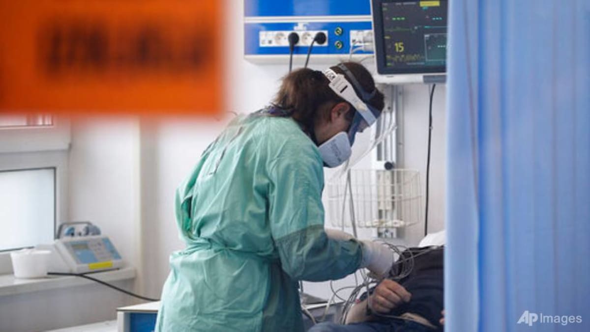 Polish hospitals struggle with surge of COVID-19 patients - CNA
