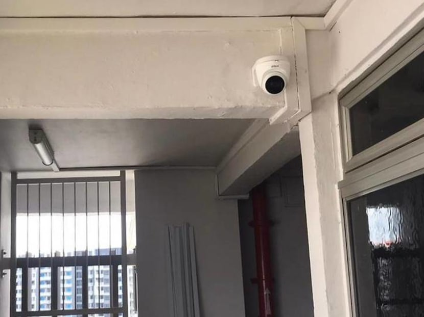 Installing CCTVs outside HDB flats is illegal, but more home owners are ...