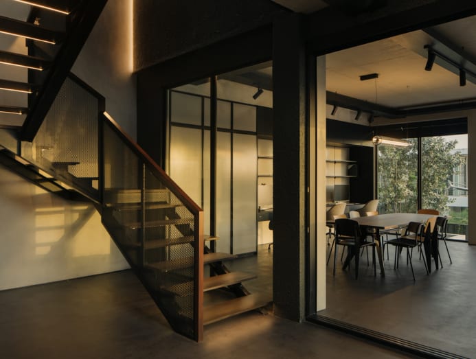 A car enthusiast’s dream house with a garage space that can fit up to ...