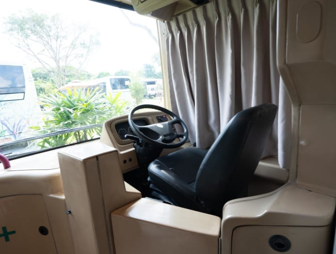 The Bus Collective at Changi Village has rooms repurposed from buses ...