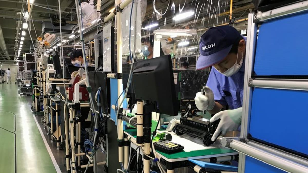 Japan factory output seen up, inflation complicates BOJ exit - Reuters ...