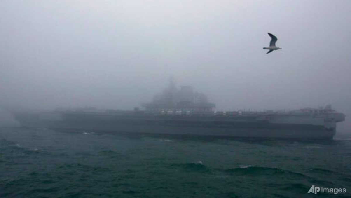 China's carrier group conducts exercises in South China Sea - CNA