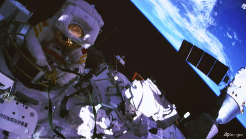 Chinese astronauts go on spacewalk from new station - CNA
