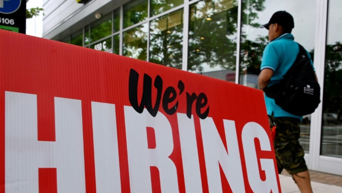 US private hiring rose in December as labour market remains strong - CNA