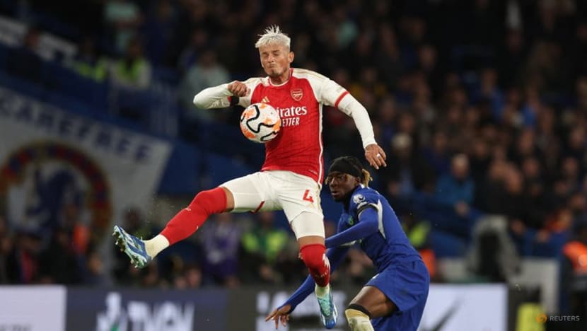 Arsenal fight back from two goals down to draw at Chelsea - CNA