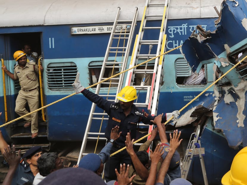 Train derails after hitting boulder in India, killing 11 - TODAY