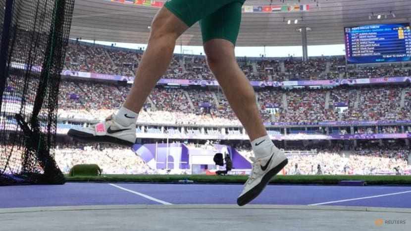 Easy day at the office for Alekna in Olympic discus qualifying - CNA