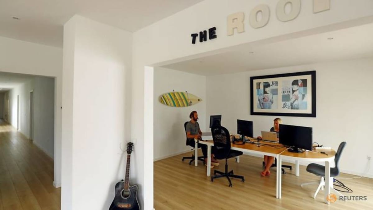 Sun-seekers enjoy European summer 'workcation' before office return ...