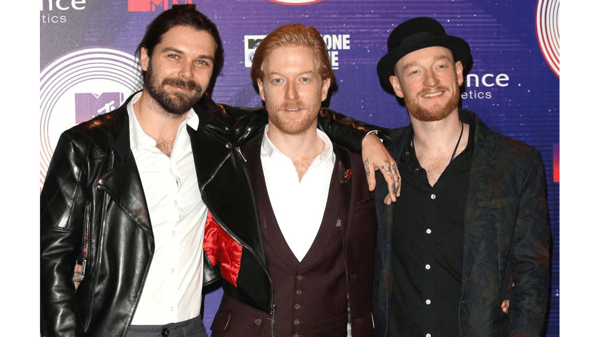 Simon Neil 'owes a bit of gratitude' to David Bowie - 8 Days