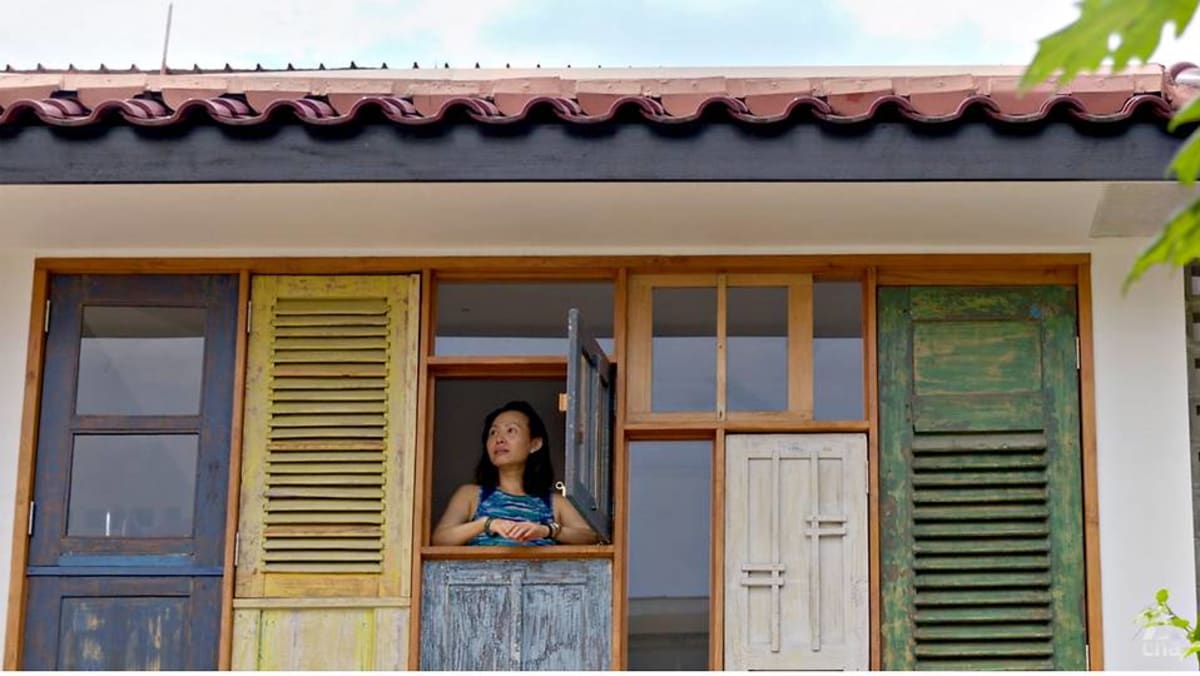 A terrace house in Singapore with upcycled Javanese windows and kampung ...