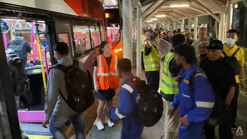 Commuters cope with rain, longer journeys on day 2 of East-West Line ...