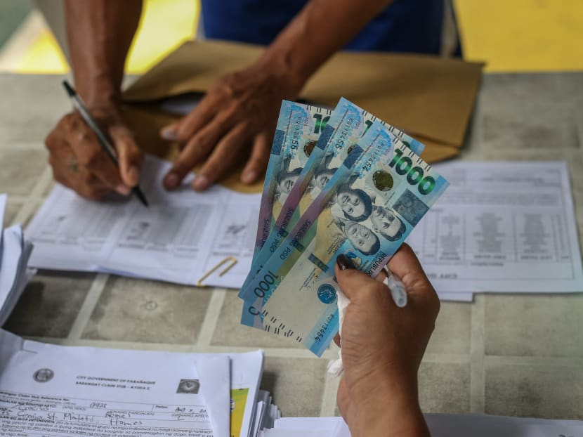 'A big help': Philippines hands out cash to poor during virus lockdown ...