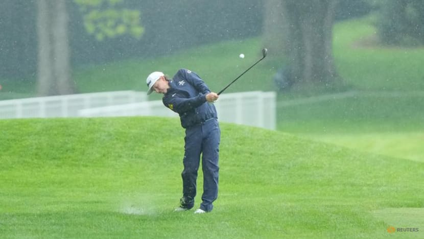 Conners holds steady to take PGA Championship lead - CNA