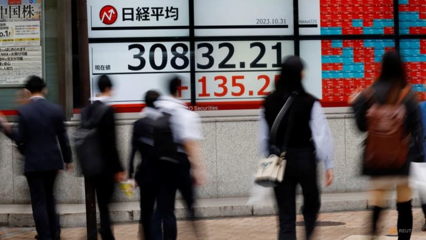 Asian stocks subdued as traders brace for inflation data - CNA