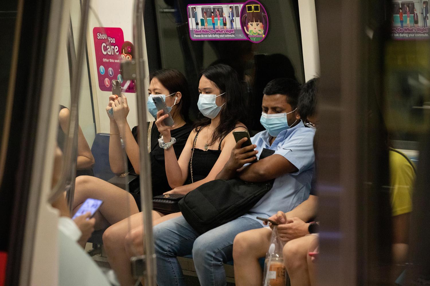 Covid-19: Should Singapore lift mask-wearing rule on public transport ...