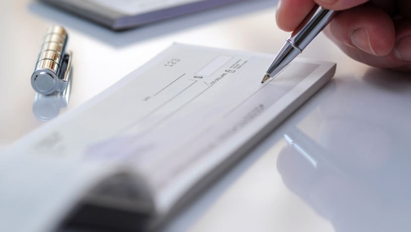 Banks in Singapore to start charging customers by November for issuing ...