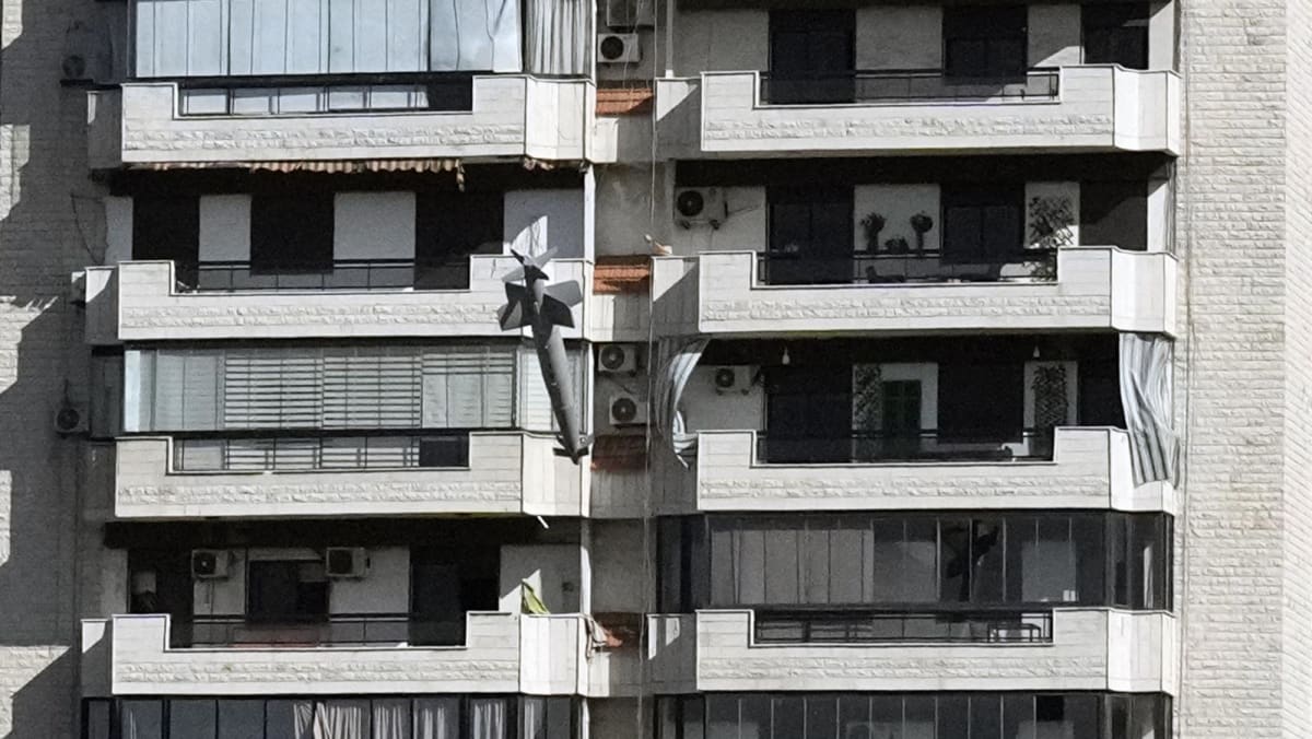 Photos capture exact moments an Israeli missile strikes building in ...