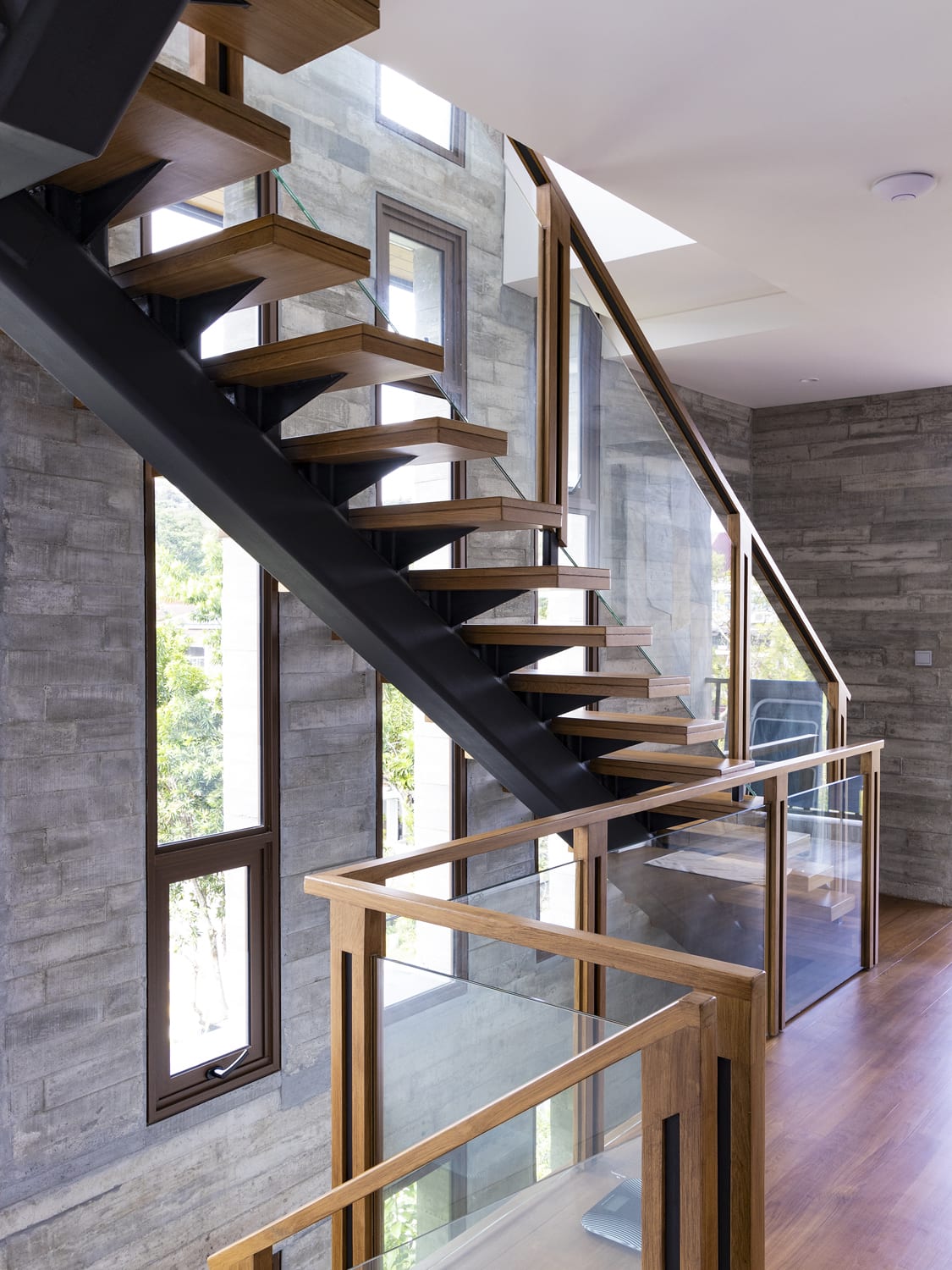 A heated pool in the basement of this Singapore home serves as the ...