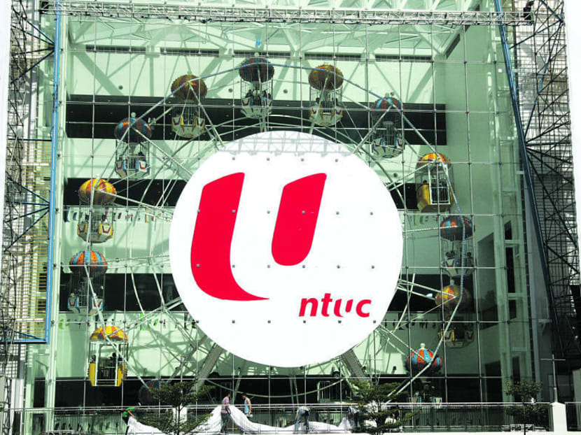 NTUC widens income criteria for two voucher programmes to benefit ...