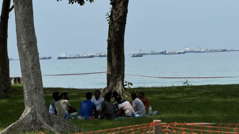 Oil spill clean-up resumes at Sentosa, East Coast Park - CNA